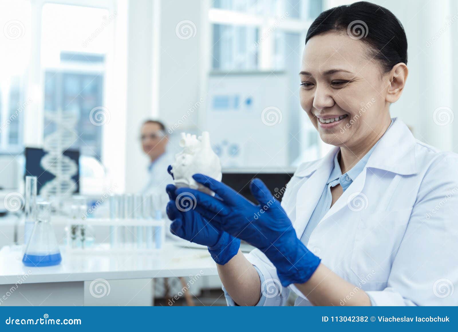 Smiling Researcher Holding an Experimental Unit Stock Photo - Image of ...