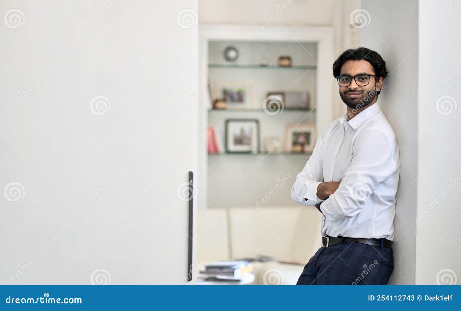 Smiling Rich Successful Young Indian Business Man Stands in Office ... Smiling Rich Successful Young Indian Business Man Stands in Office ...