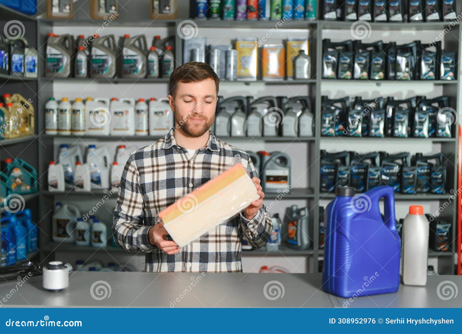 Smiling Salesman Auto Parts Store Stock Photo - Image of chooses, sell ...