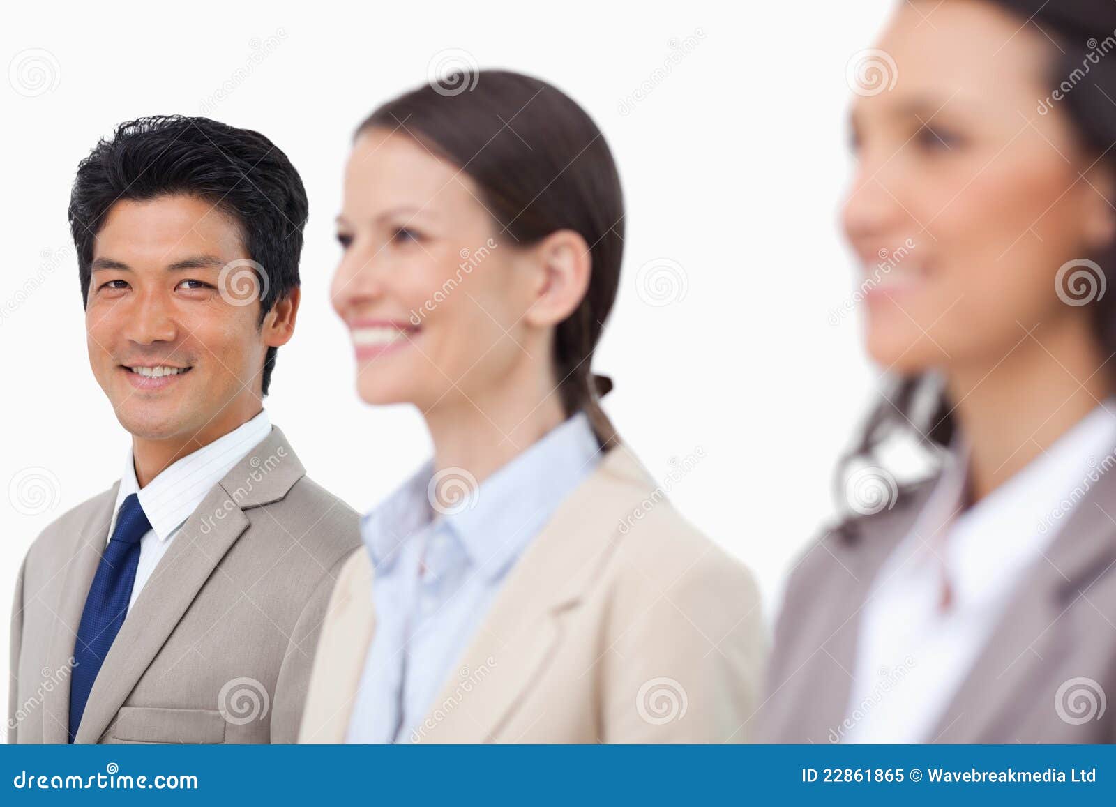 Smiling Salesman Standing Next To Smiling Colleagues Stock Image ...