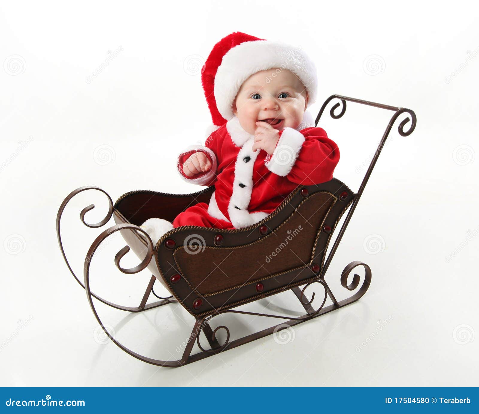 Smiling Santa Baby Sitting in a Sleigh Stock Photo - Image of leisure ...