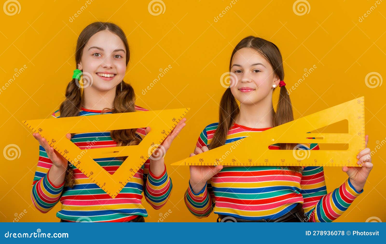 Smiling School Kids Hold Math Tool of Triangle Stock Photo - Image of ...