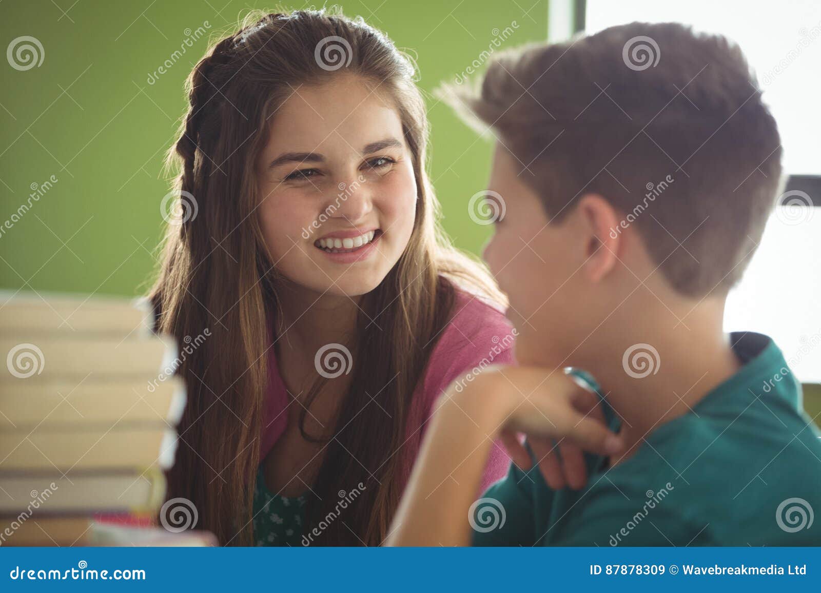 Smiling School Kids Interacting in Library Stock Image - Image of ...