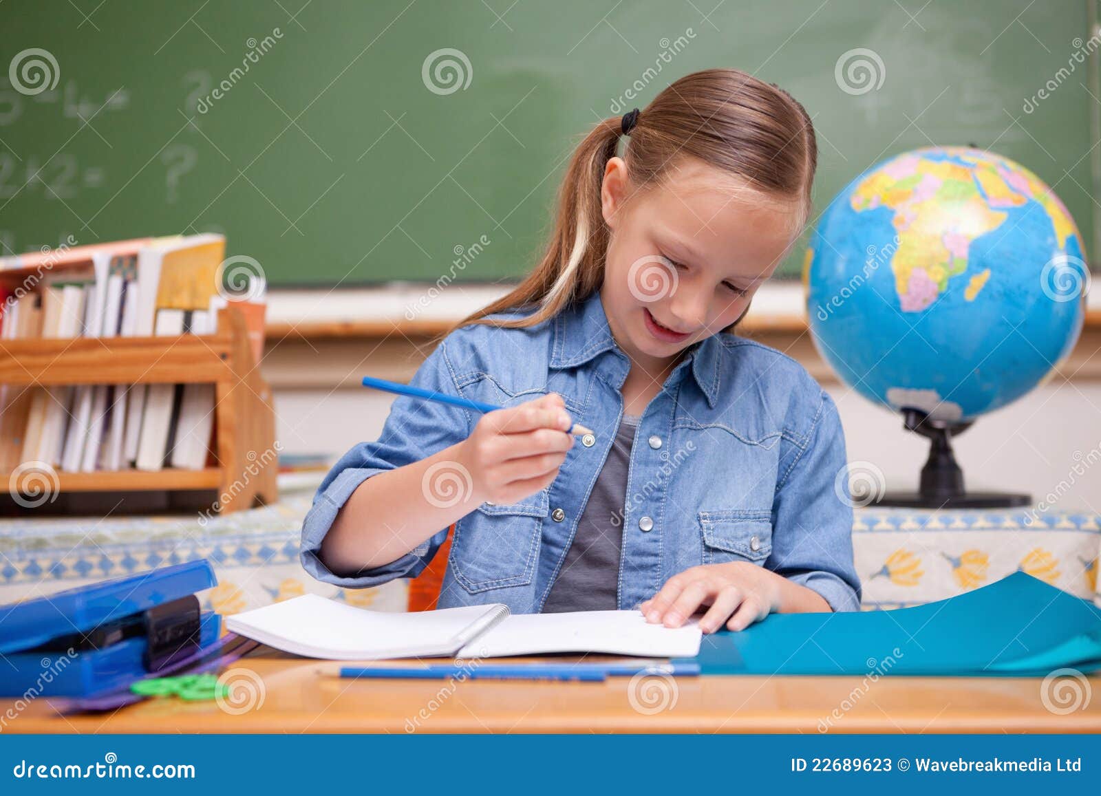 Smiling Schoolgirl Doing Classwork Stock Image - Image of class ...