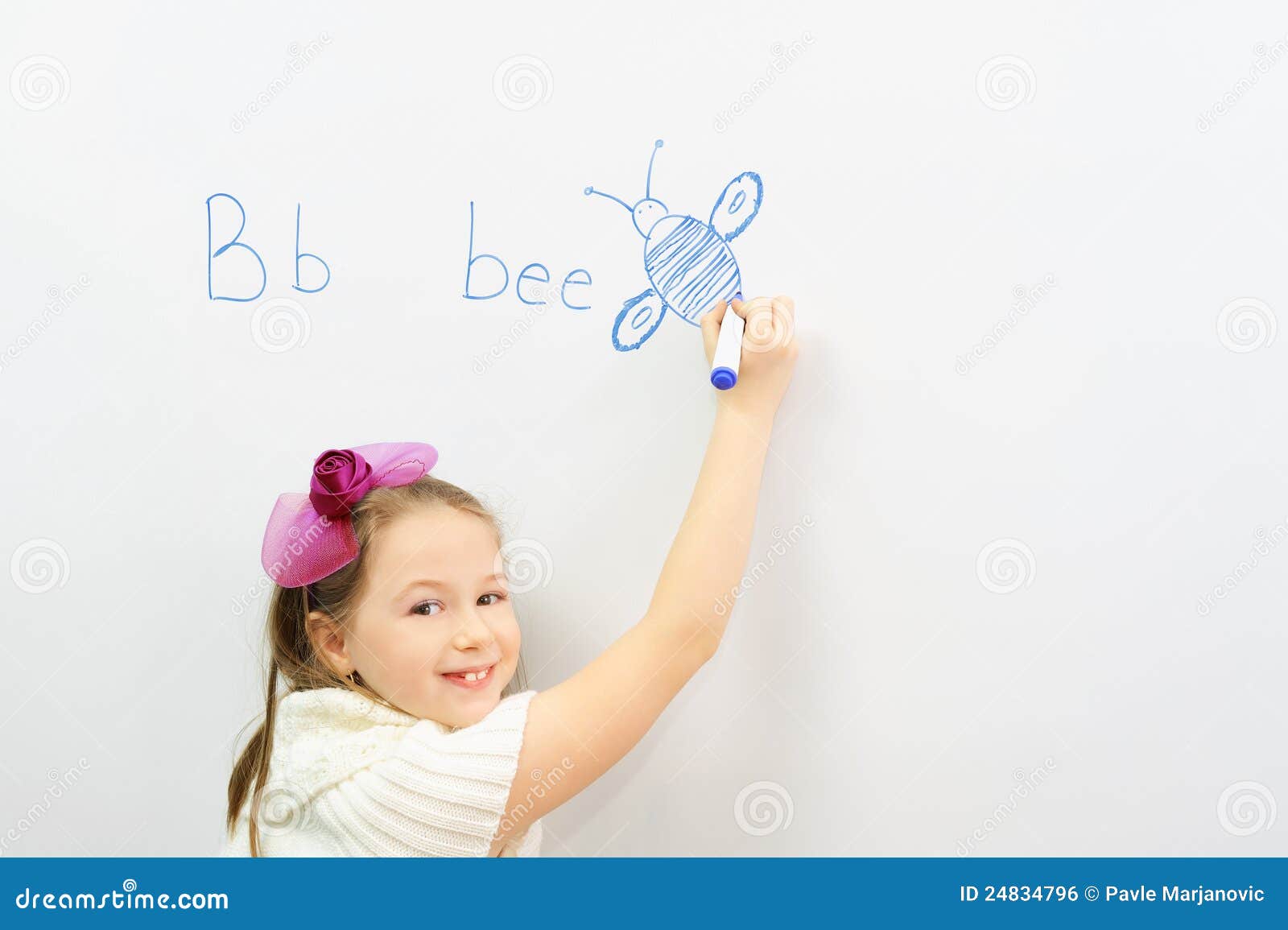 Smiling Schoolgirl Learning To Write Letter B Stock Photo - Image of ...