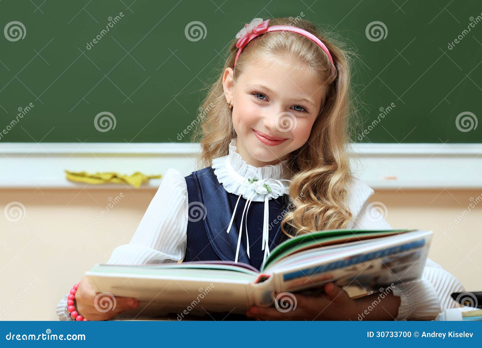 Smiling schoolgirl stock photo. Image of knowledge, blonde - 30733700