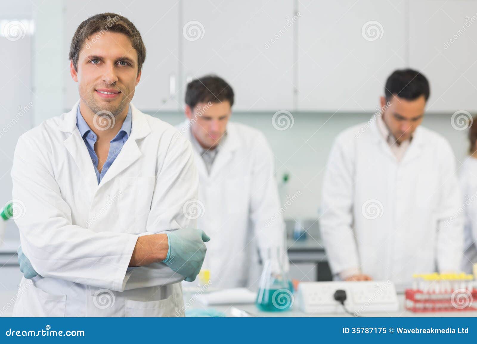 Smiling Scientist with Colleagues at Work in the Lab Stock Image ...