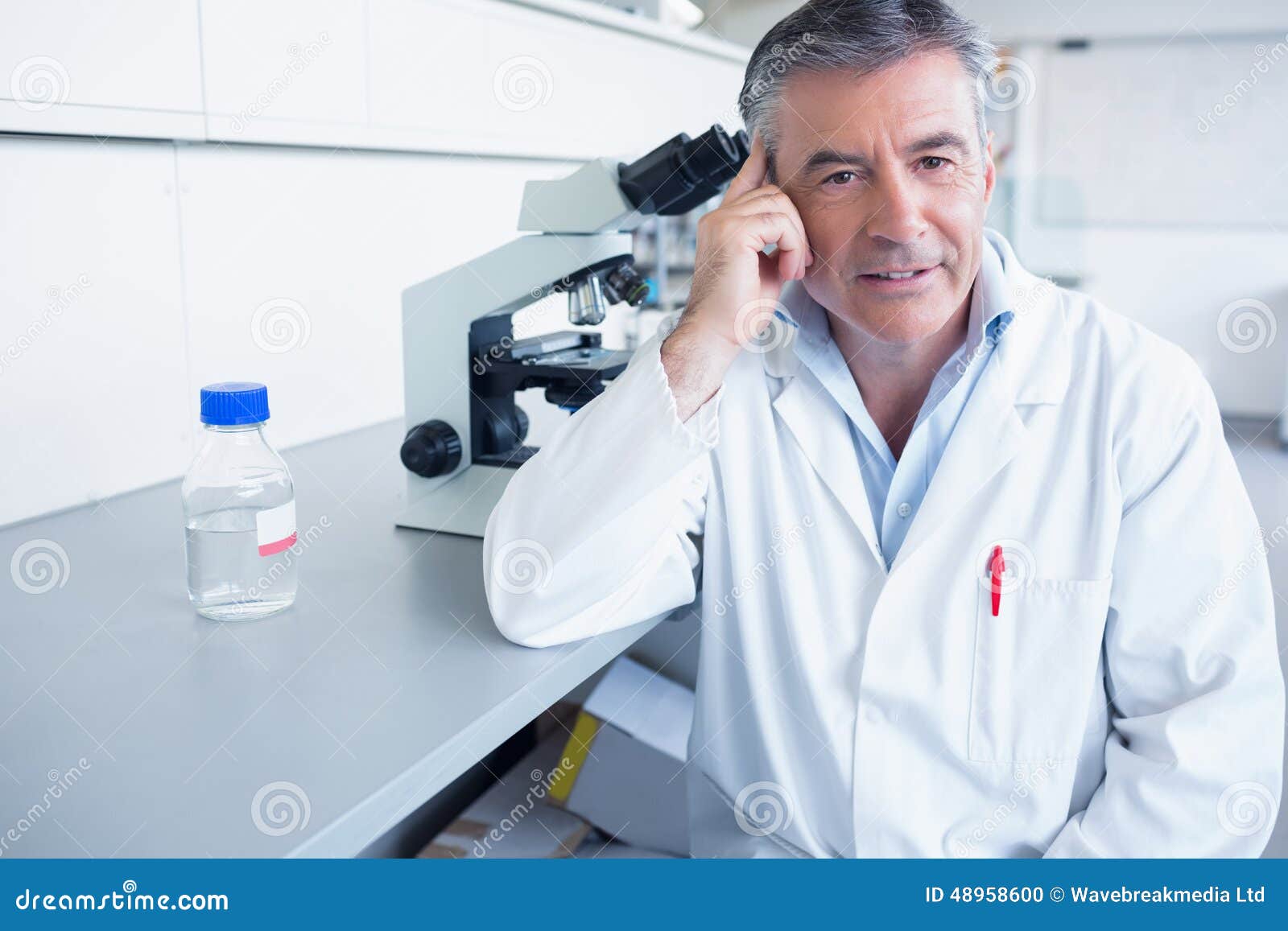 Smiling Scientist Leaning on the Table Stock Photo - Image of ...