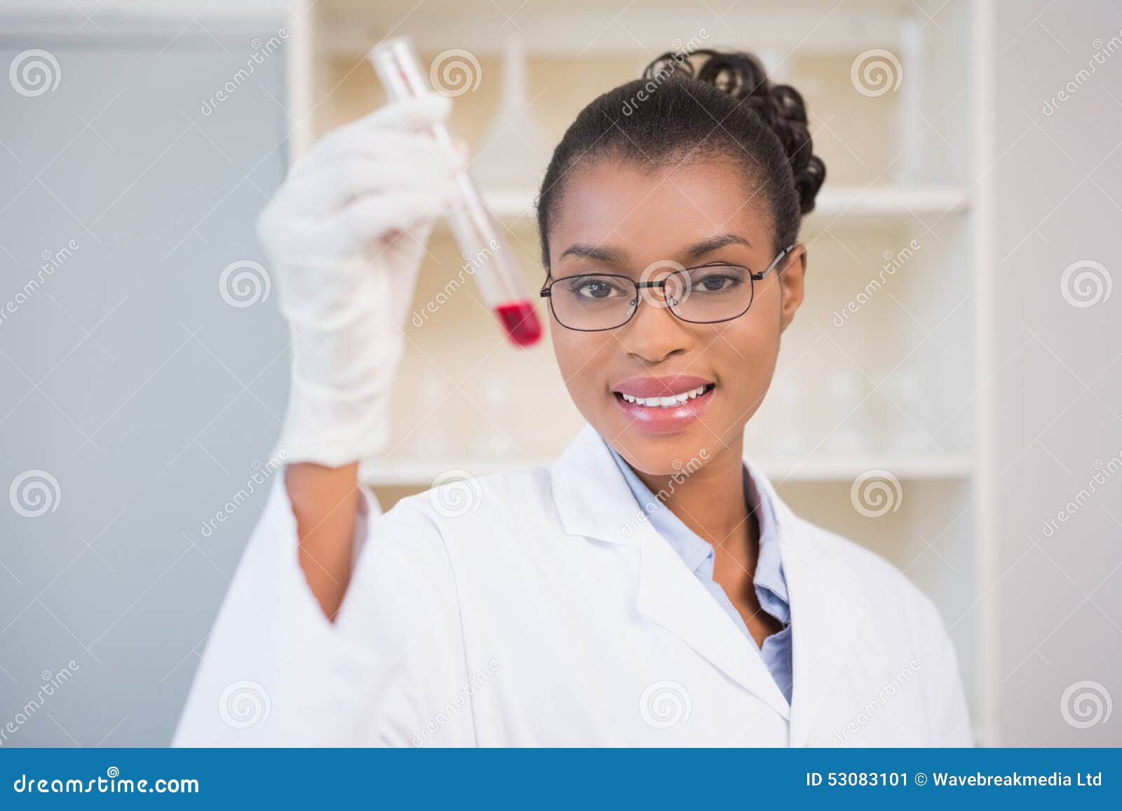 Smiling Scientist Showing Test Tube with Red Fluid Stock Image - Image ...