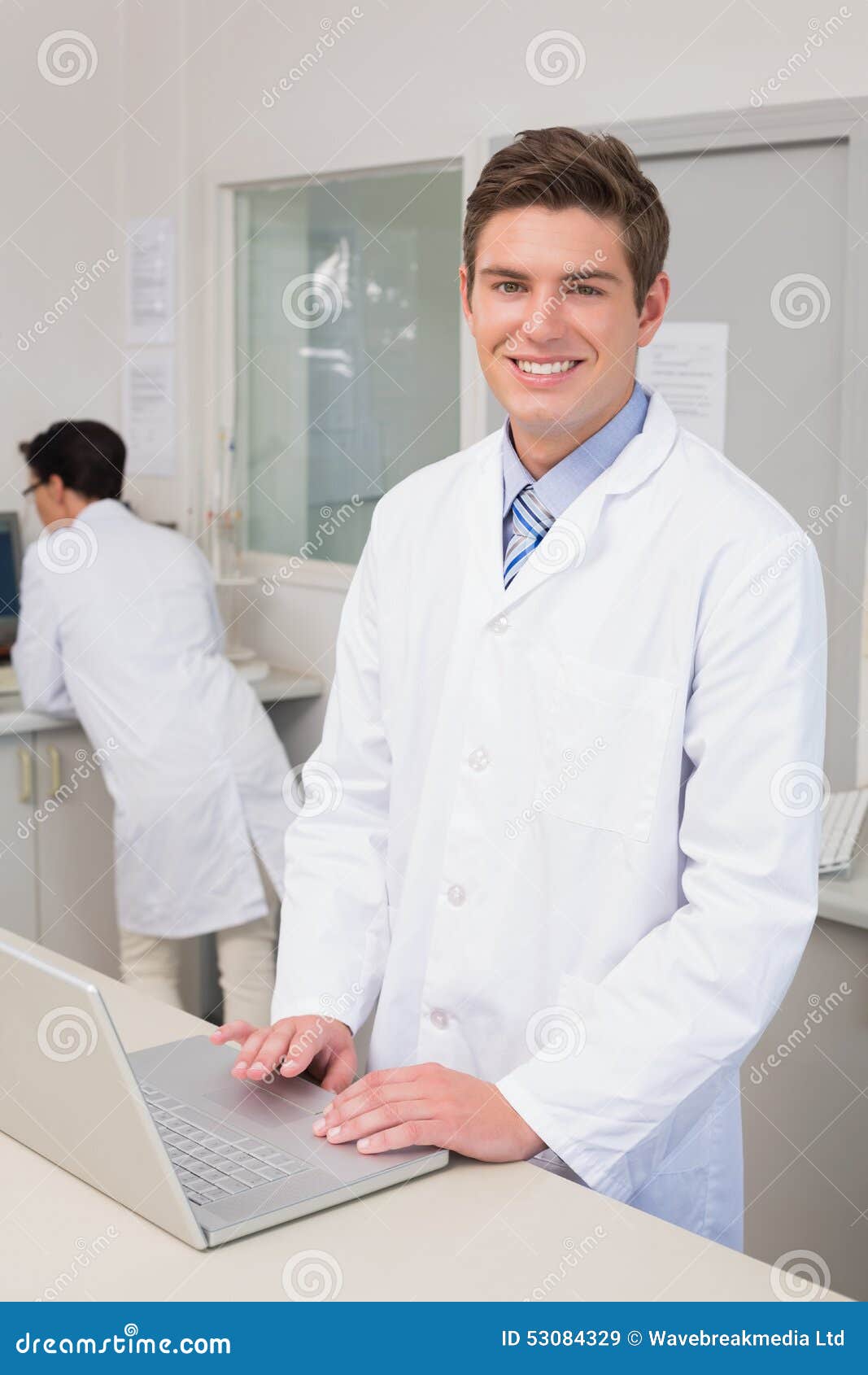 Smiling Scientist Using Laptop Stock Image - Image of medical ...