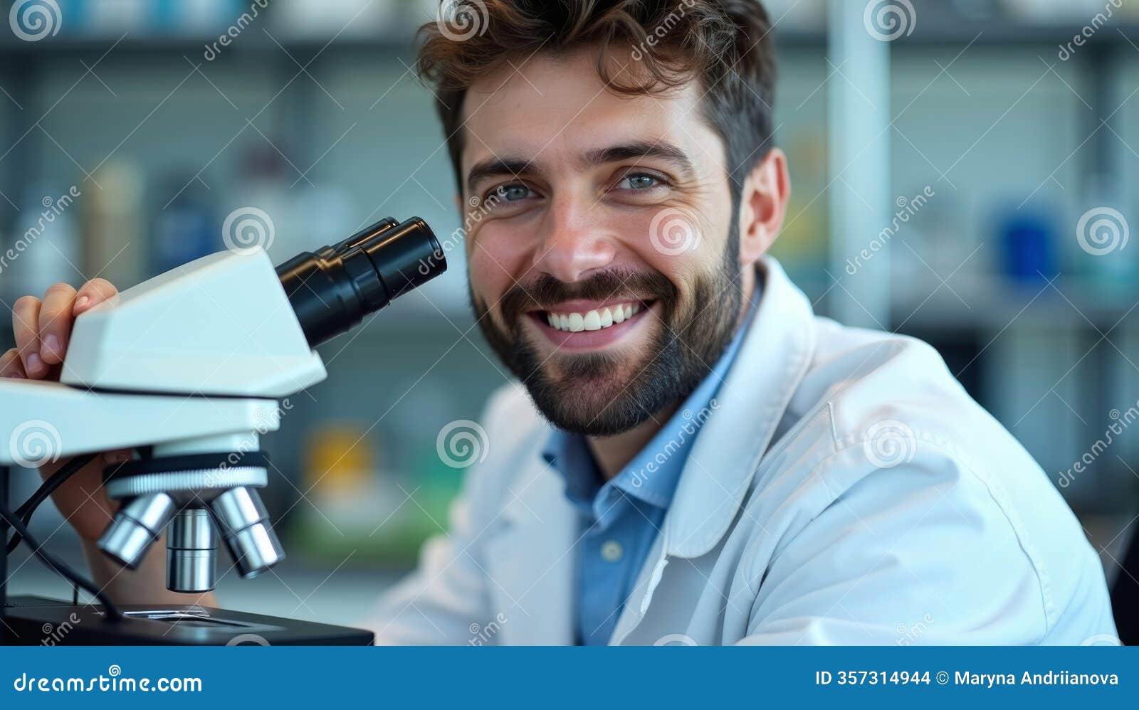 Smiling Scientist Using Microscope in Laboratory Research Experiment ...