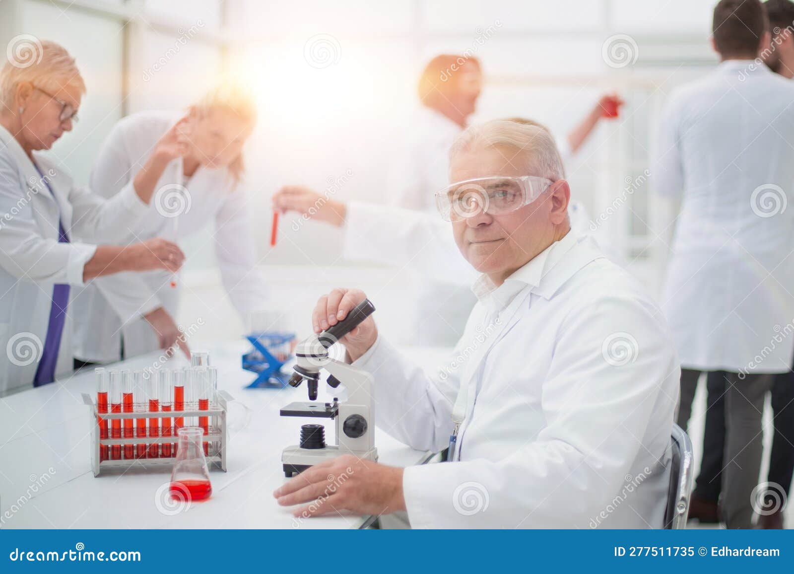 Smiling Scientist at the Workplace in the Laboratory. Stock Image ...