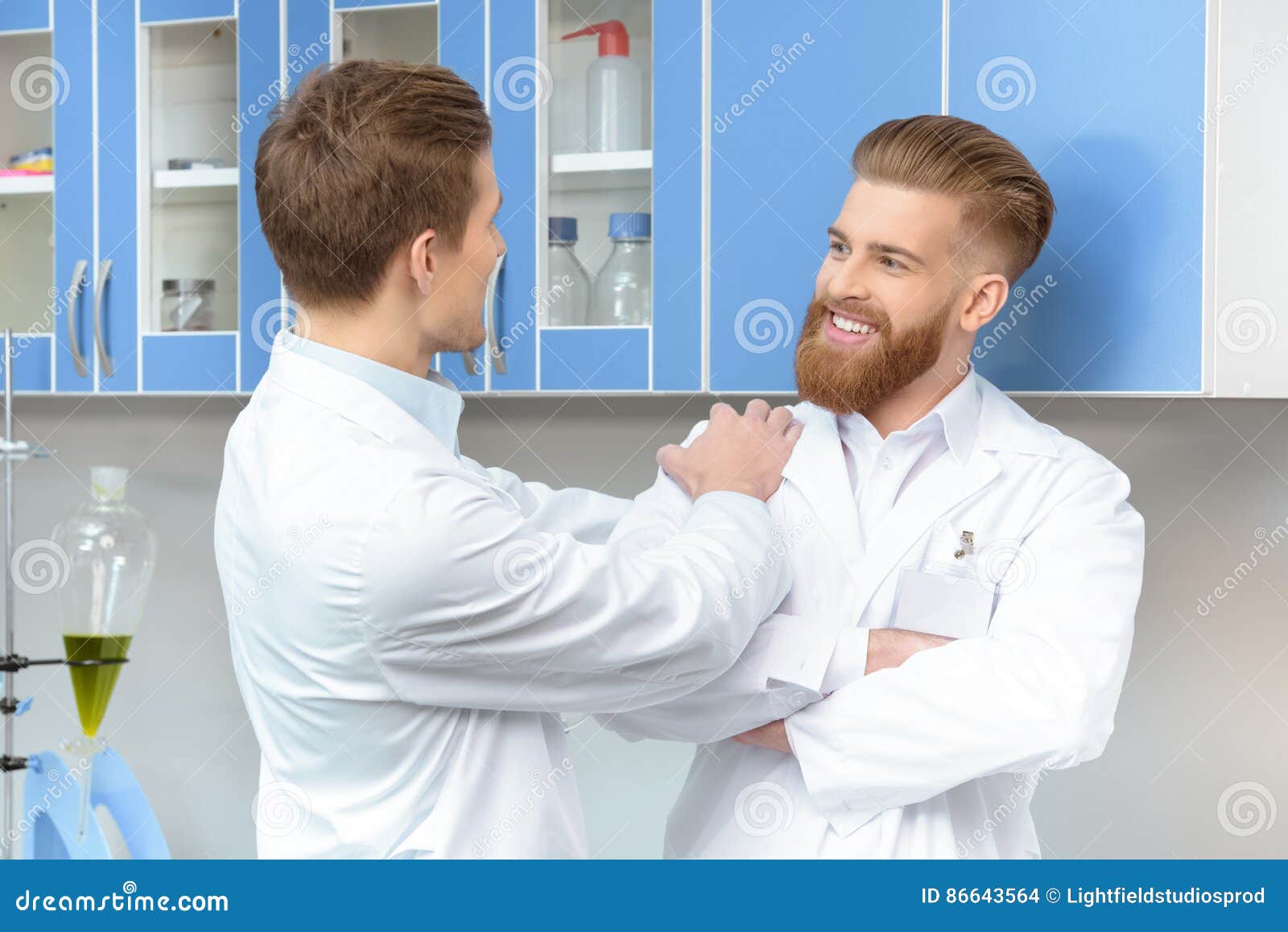 Smiling Scientists Discussing Work in Lab during Break Stock Photo ...