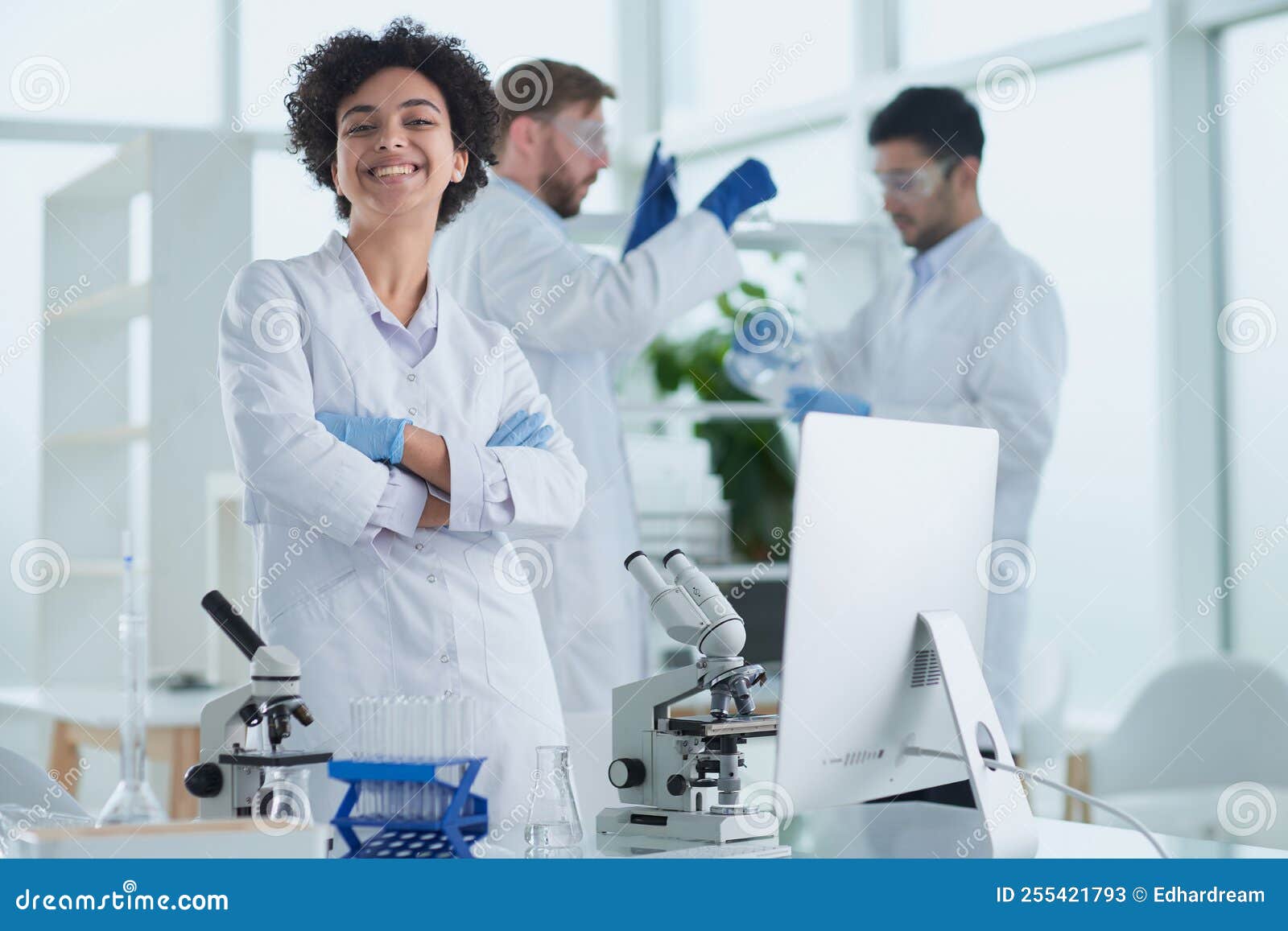 Smiling Scientists Looking at Camera Arms Crossed in Laboratory Stock ...