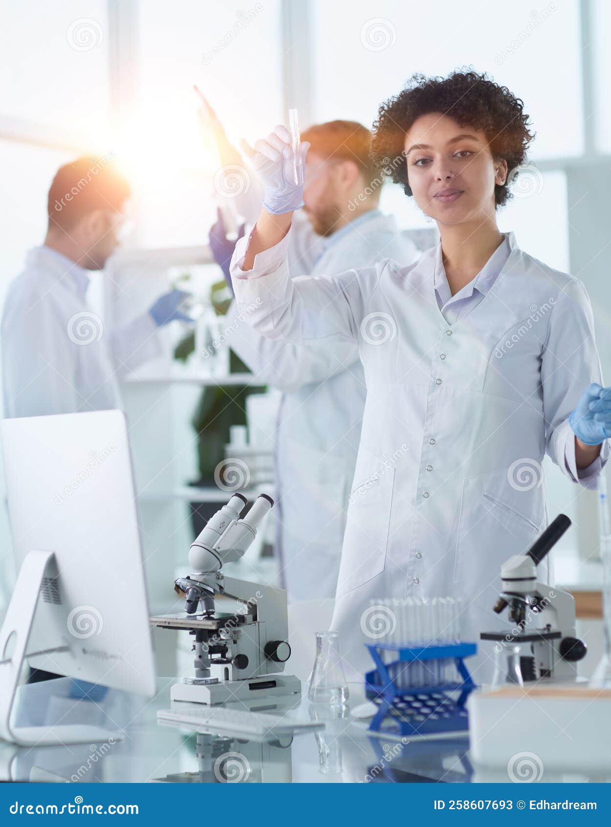 Smiling Scientists Looking at Camera Arms Crossed in Laboratory Stock ...
