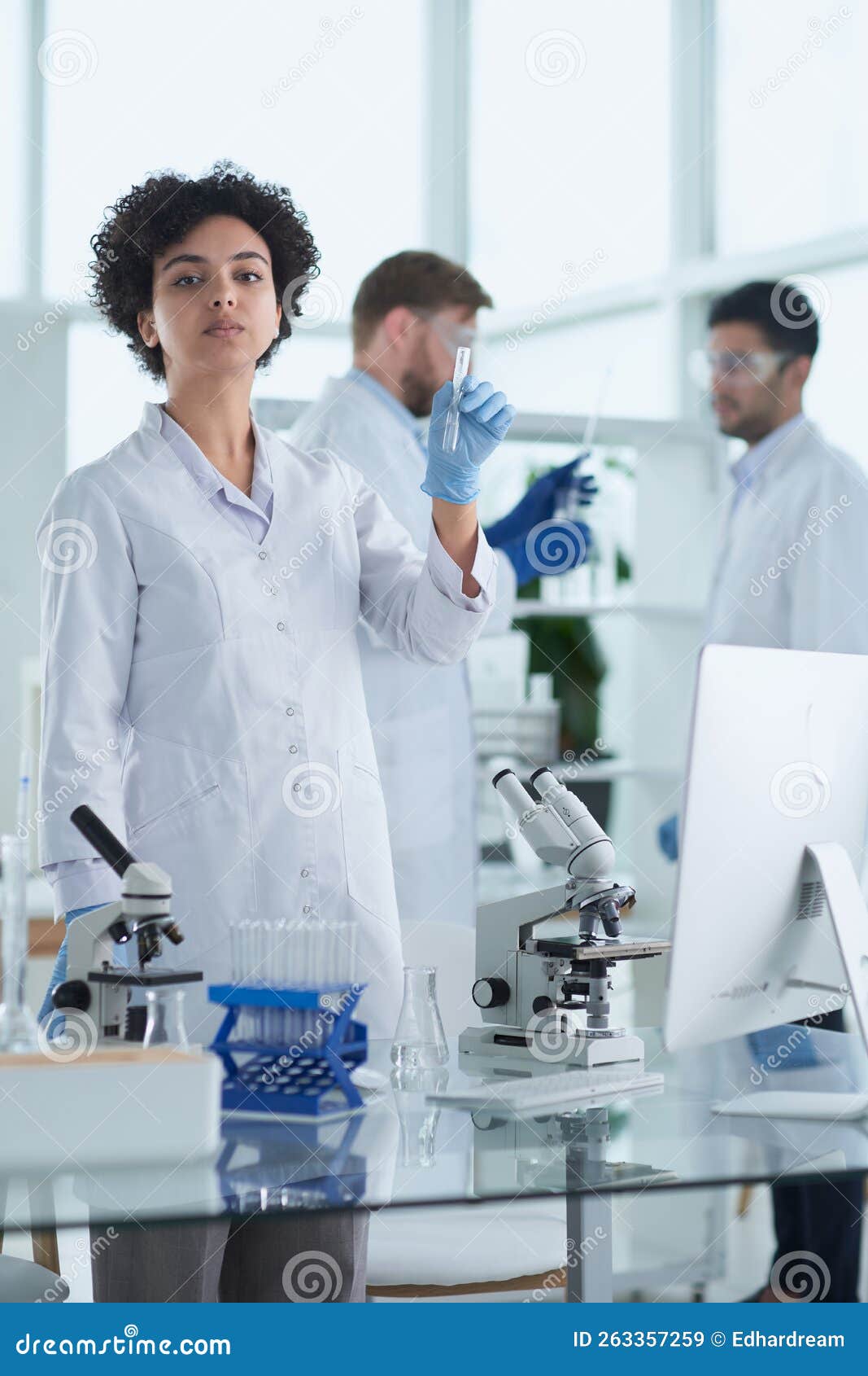 Smiling Scientists Looking at Camera Arms Crossed in Laboratory Stock ...