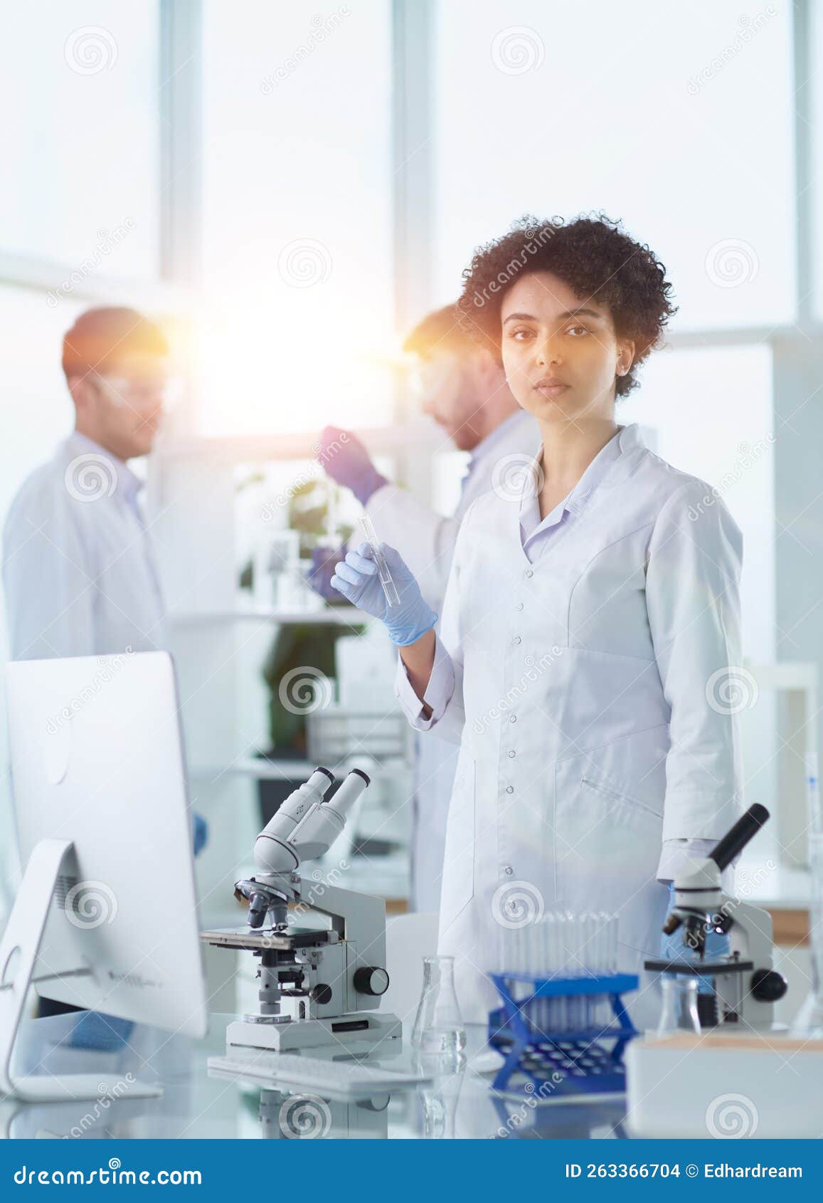 Smiling Scientists Looking at Camera Arms Crossed in Laboratory Stock ...