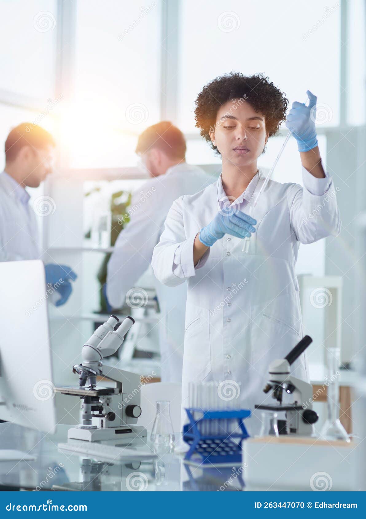 Smiling Scientists Looking at Camera Arms Crossed in Laboratory Stock ...