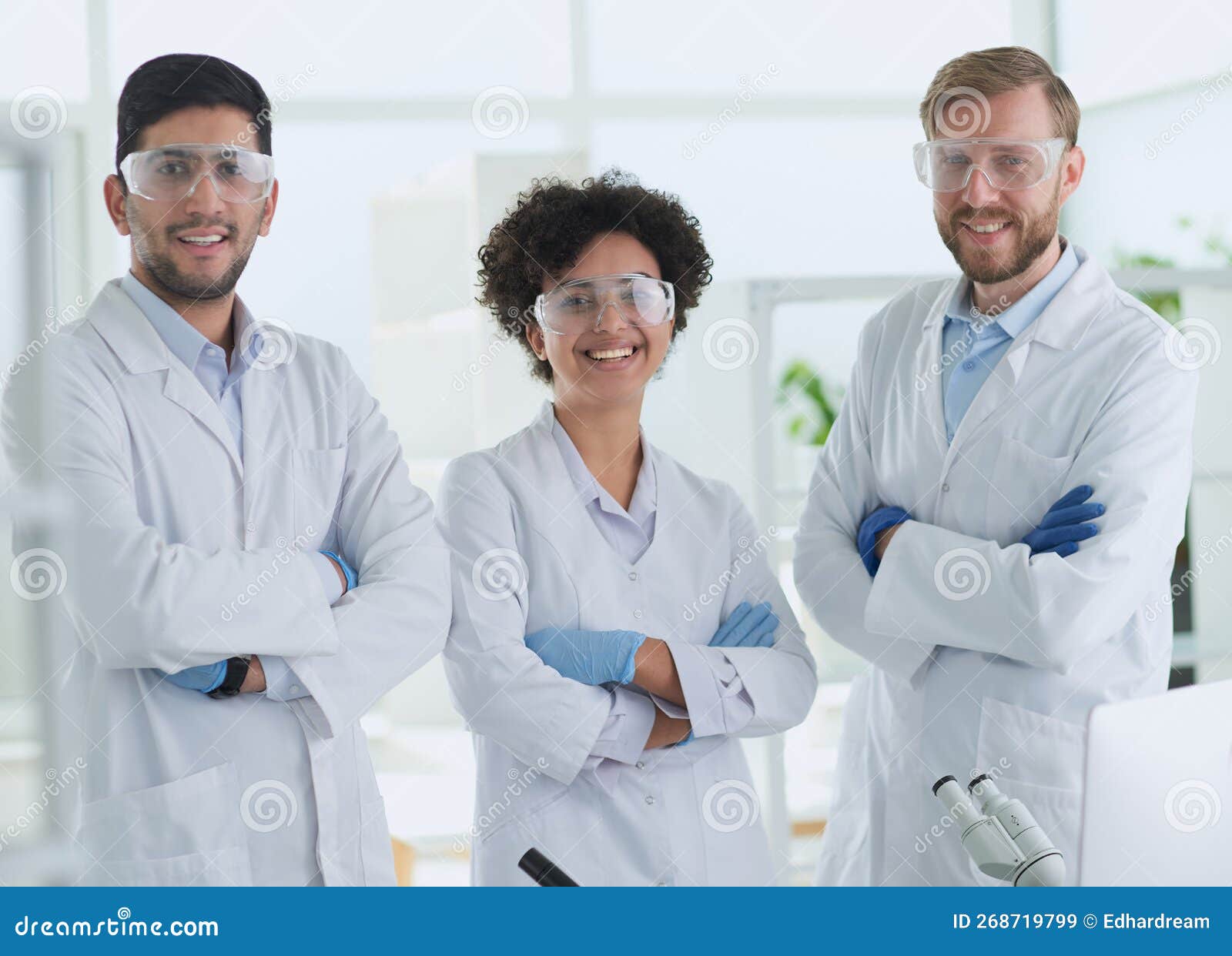 Smiling Scientists Looking at Camera Arms Crossed in Laboratory Stock ...