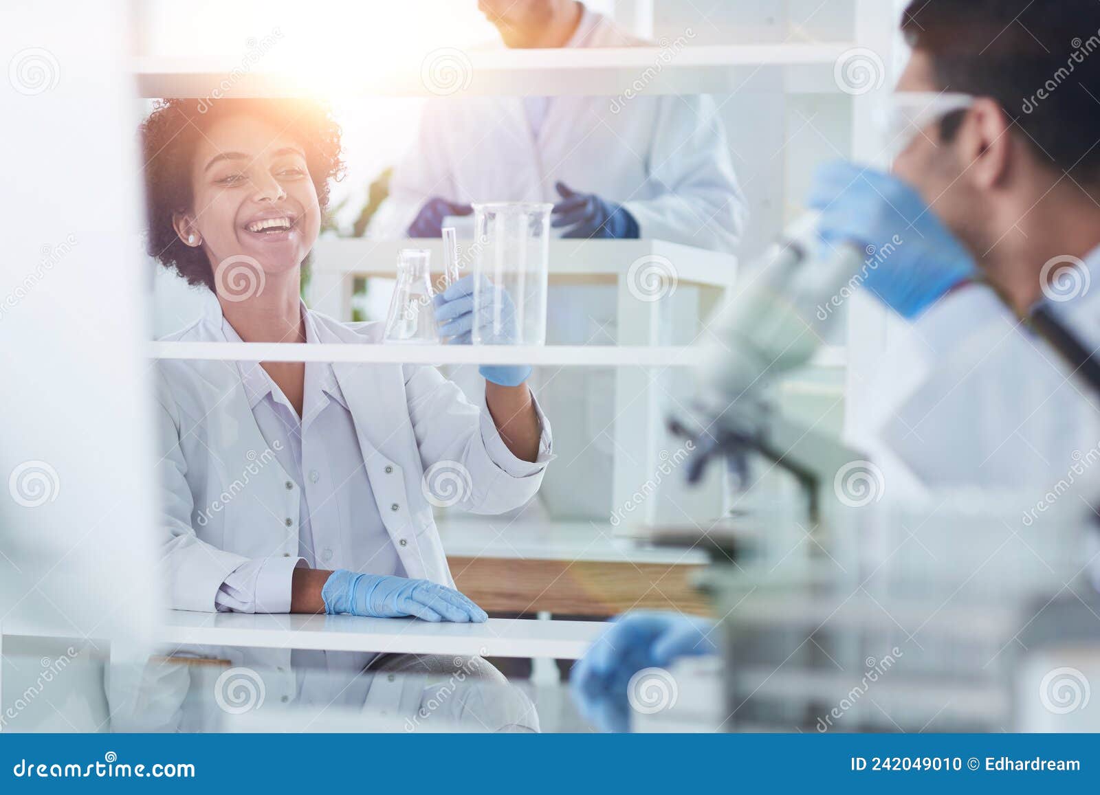 Smiling Scientists Looking at Camera Arms Crossed in Laboratory Stock ...