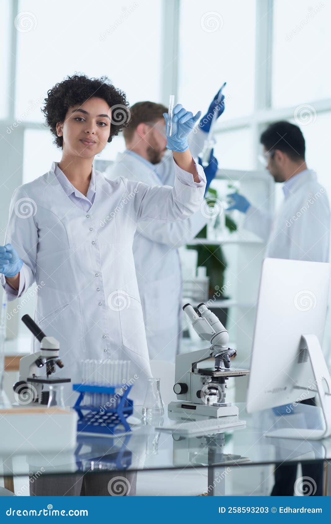 Smiling Scientists Looking at Camera Arms Crossed in Laboratory Stock ...