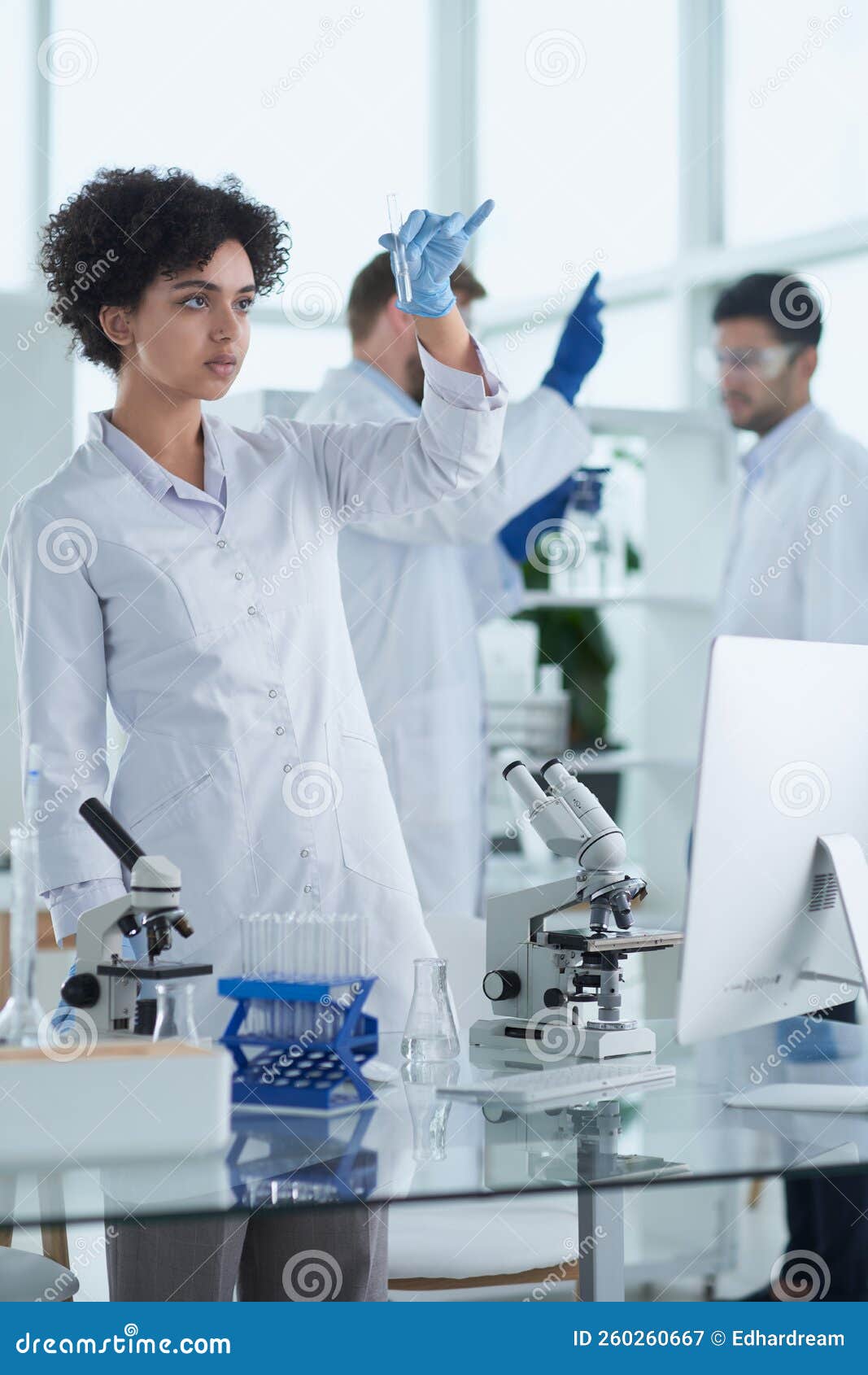 Smiling Scientists Looking at Camera Arms Crossed in Laboratory Stock ...