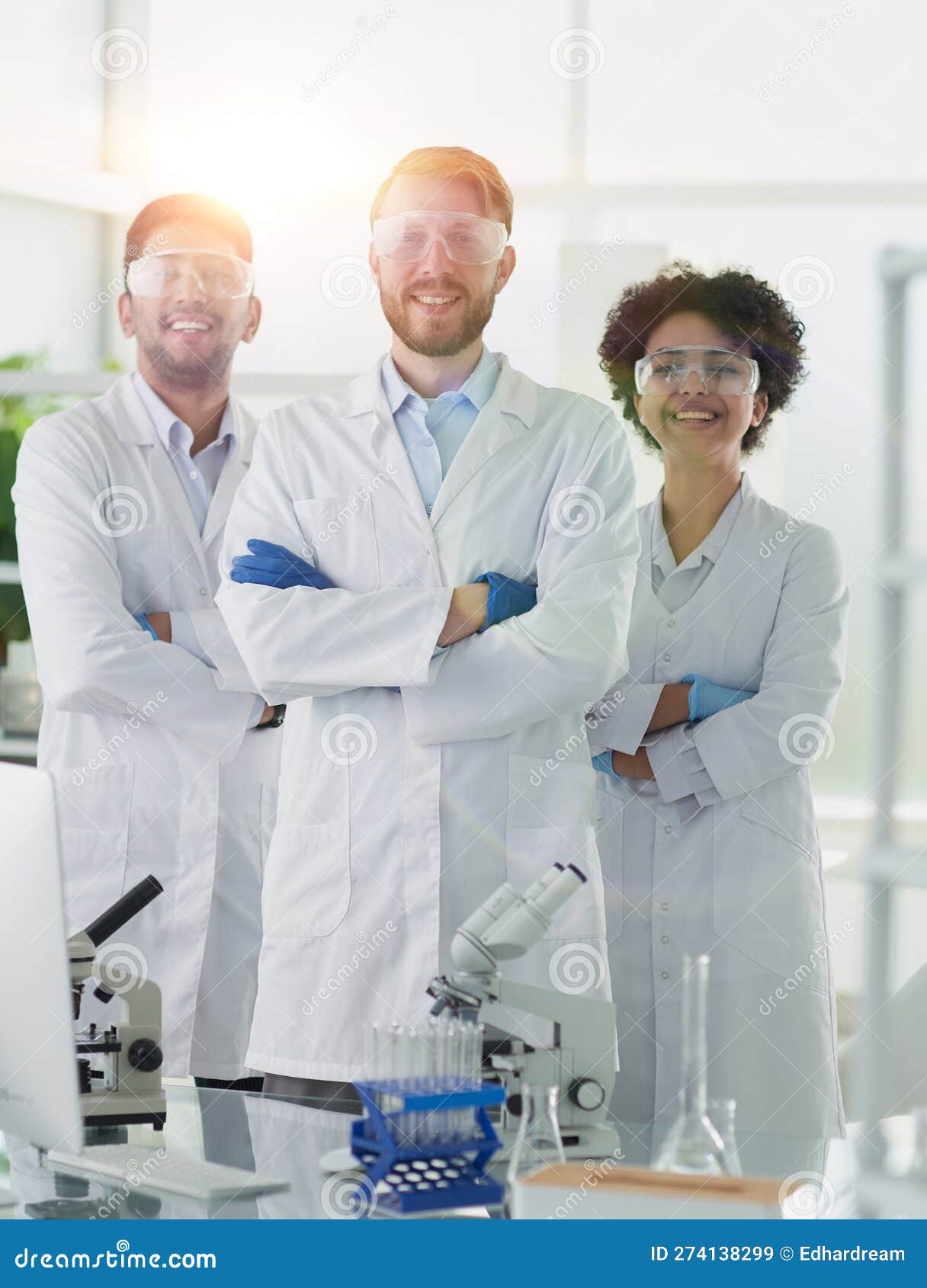 Smiling Scientists Looking at Camera Arms Crossed in Laboratory Stock ...