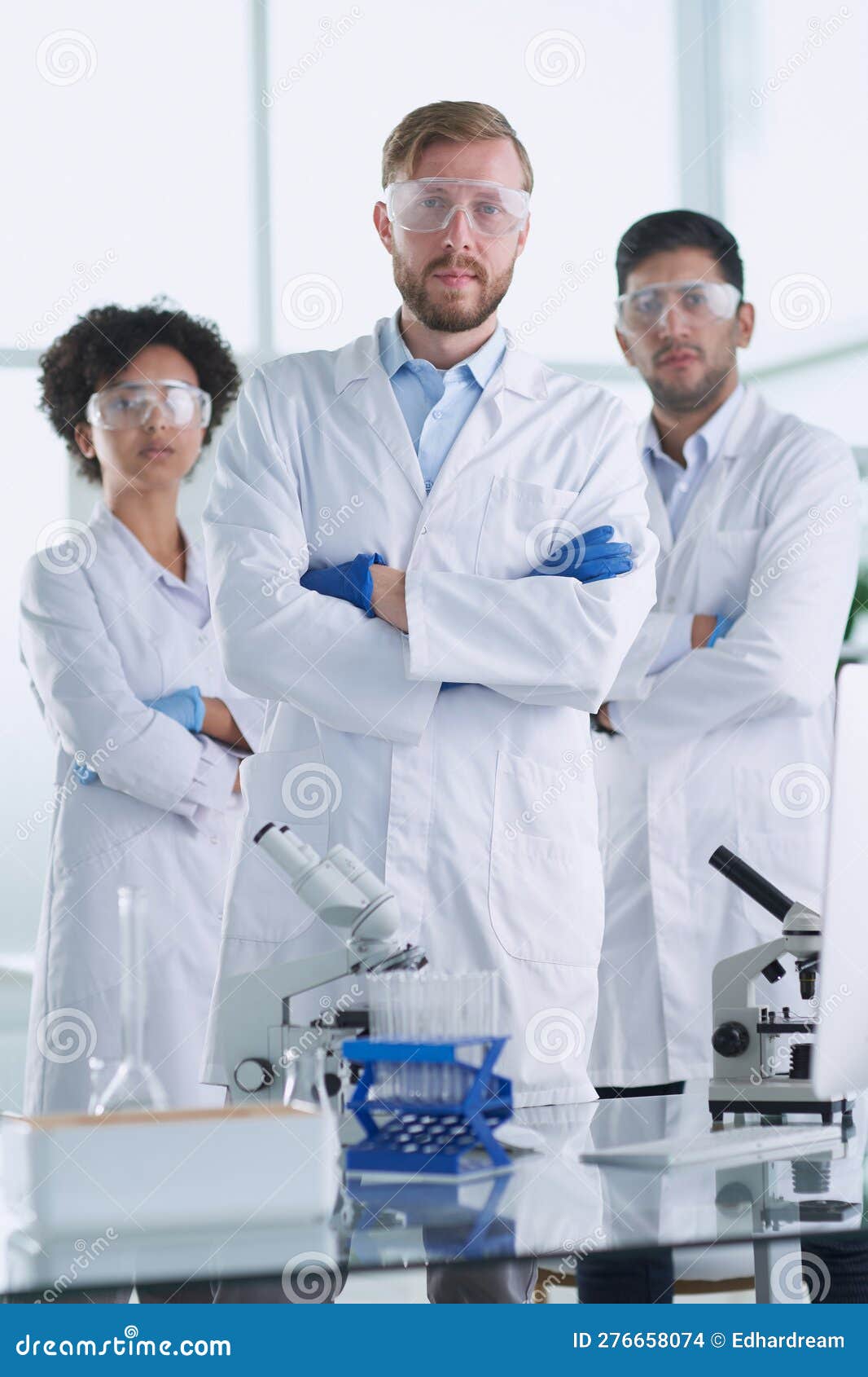 Smiling Scientists Looking at Camera Arms Crossed in Laboratory Stock ...