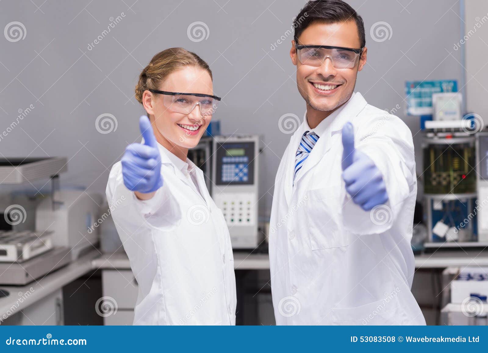 Smiling Scientists Looking at Camera Thumbs Up Stock Photo - Image of ...
