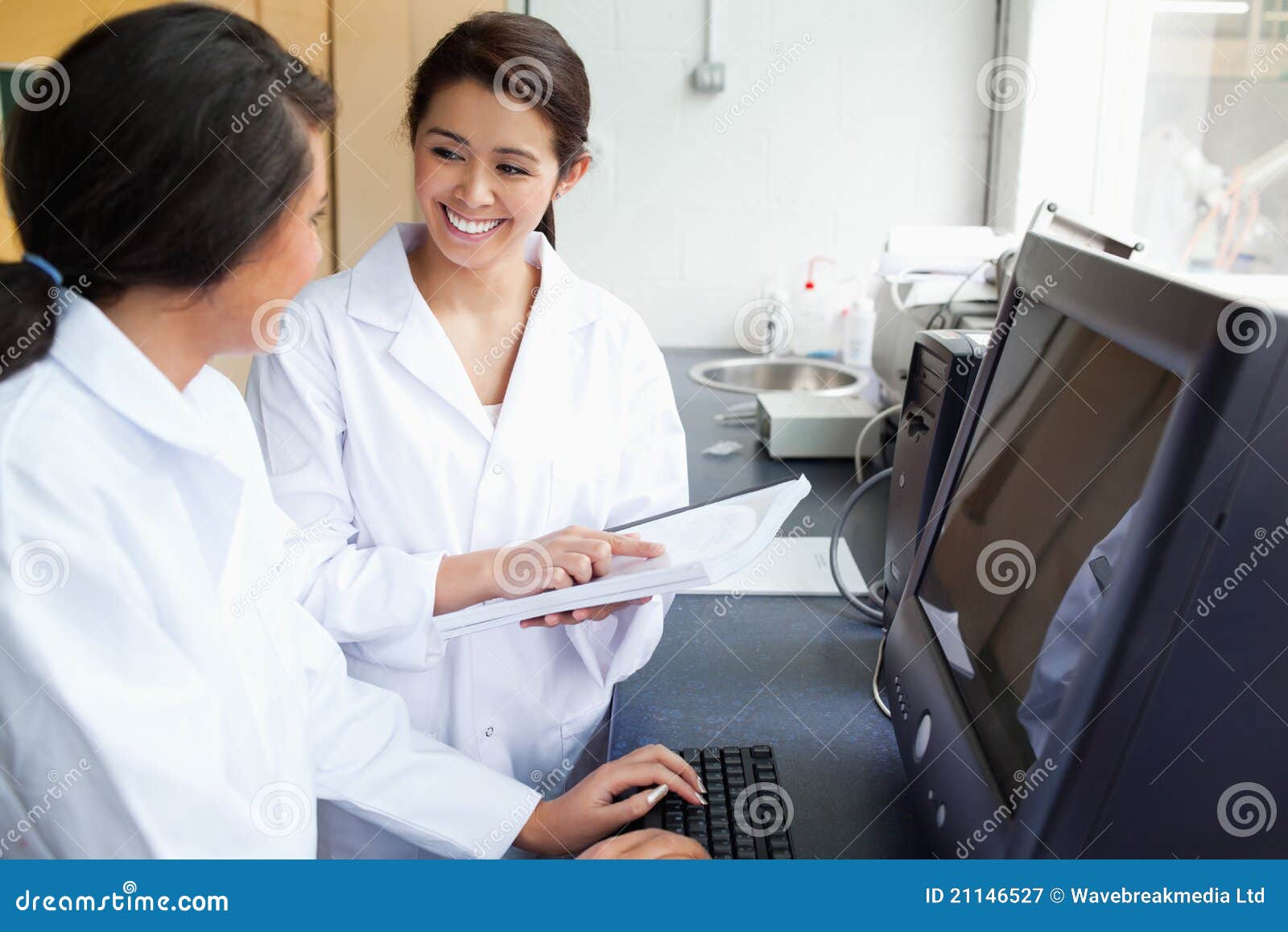Smiling Scientists Working with a Monitor Stock Image - Image of intent ...
