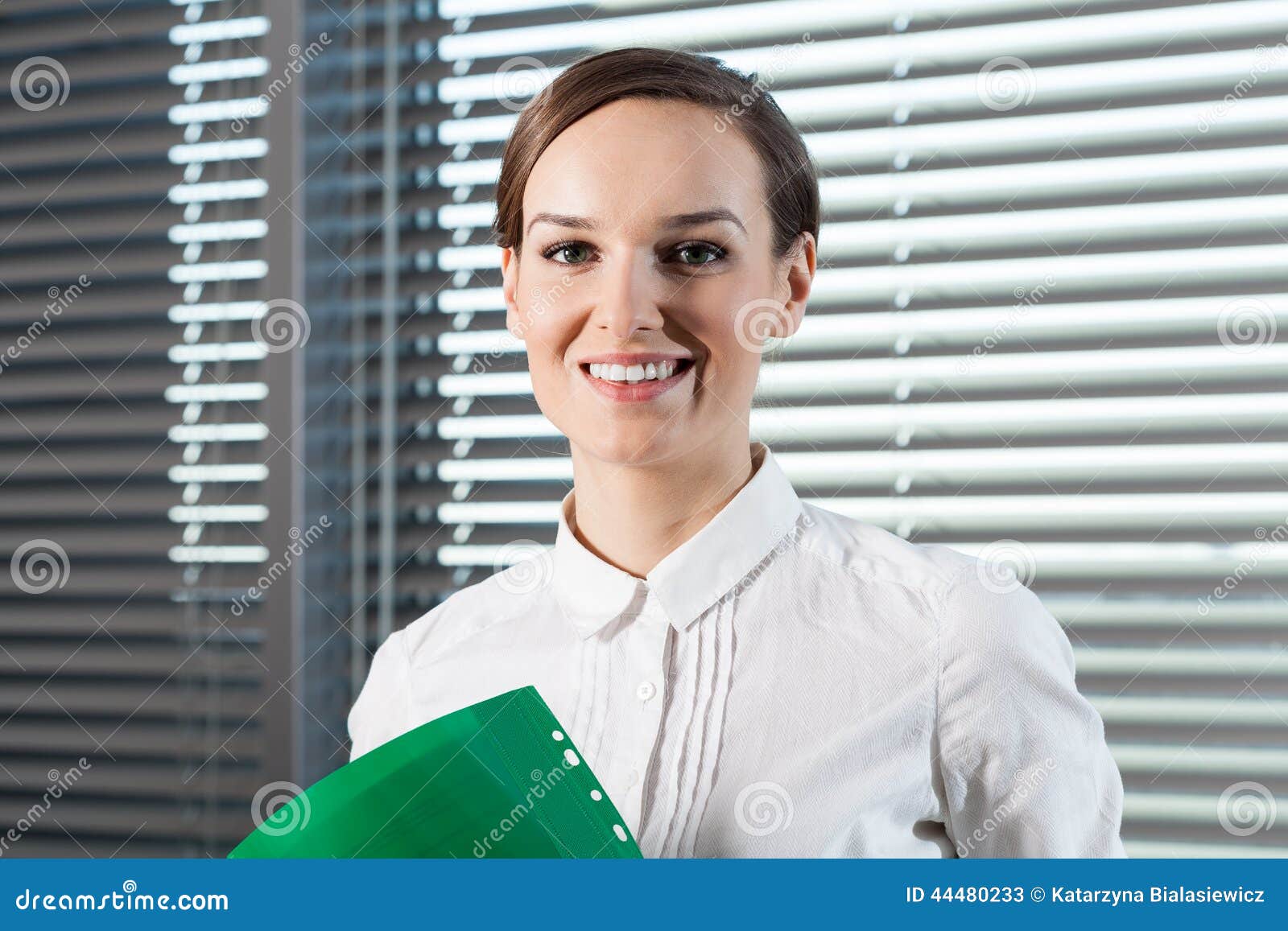Smiling Secretary Holding Green Folder Stock Image - Image of female ...