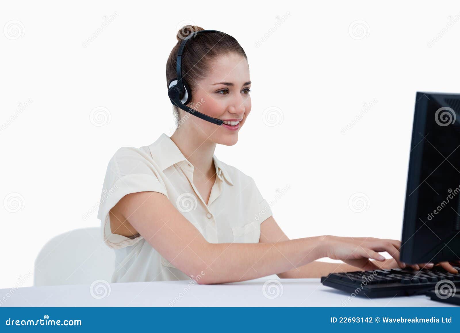 Smiling Secretary Making an Appointment Stock Photo - Image of keyboard ...