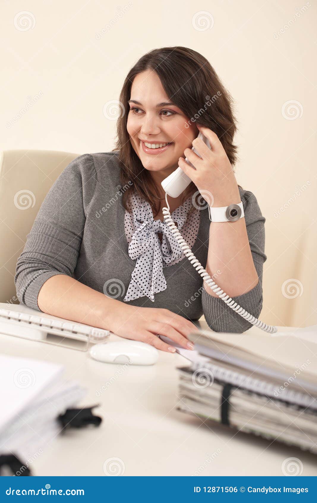 Smiling Secretary on Phone at Office Stock Photo - Image of size ...