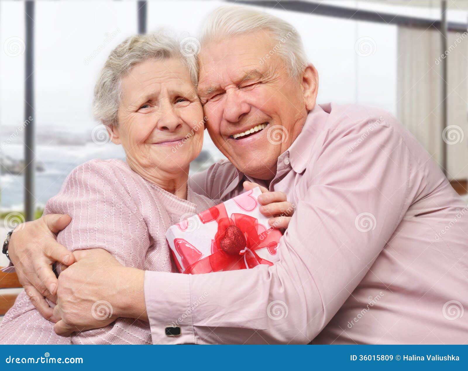 Smiling Senior Couple Hugging Stock Image - Image of person, people ...