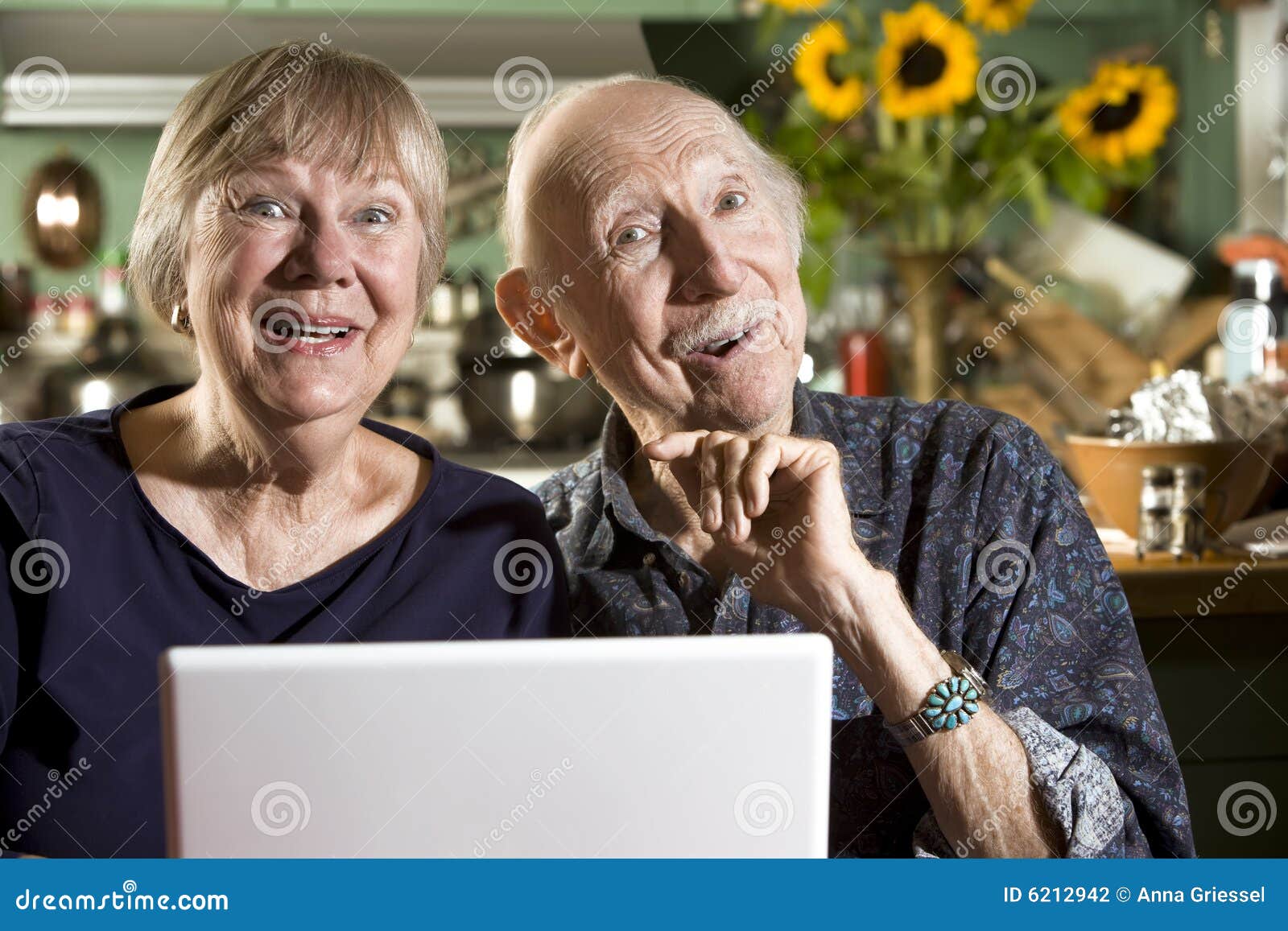 Smiling Senior Couple with a Laptop Computer Stock Photo - Image of ...