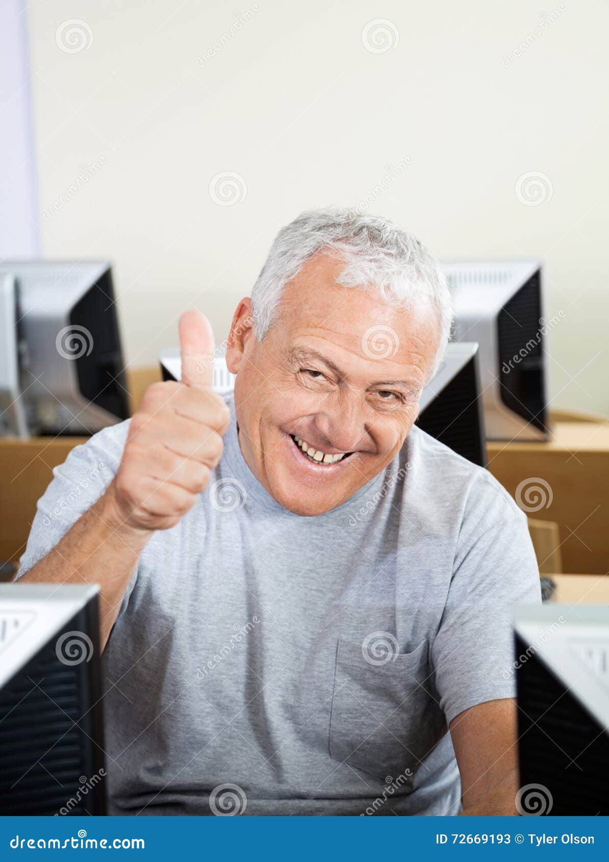 Smiling Senior Man Gesturing Thumbs Up in Computer Class Stock Image ...