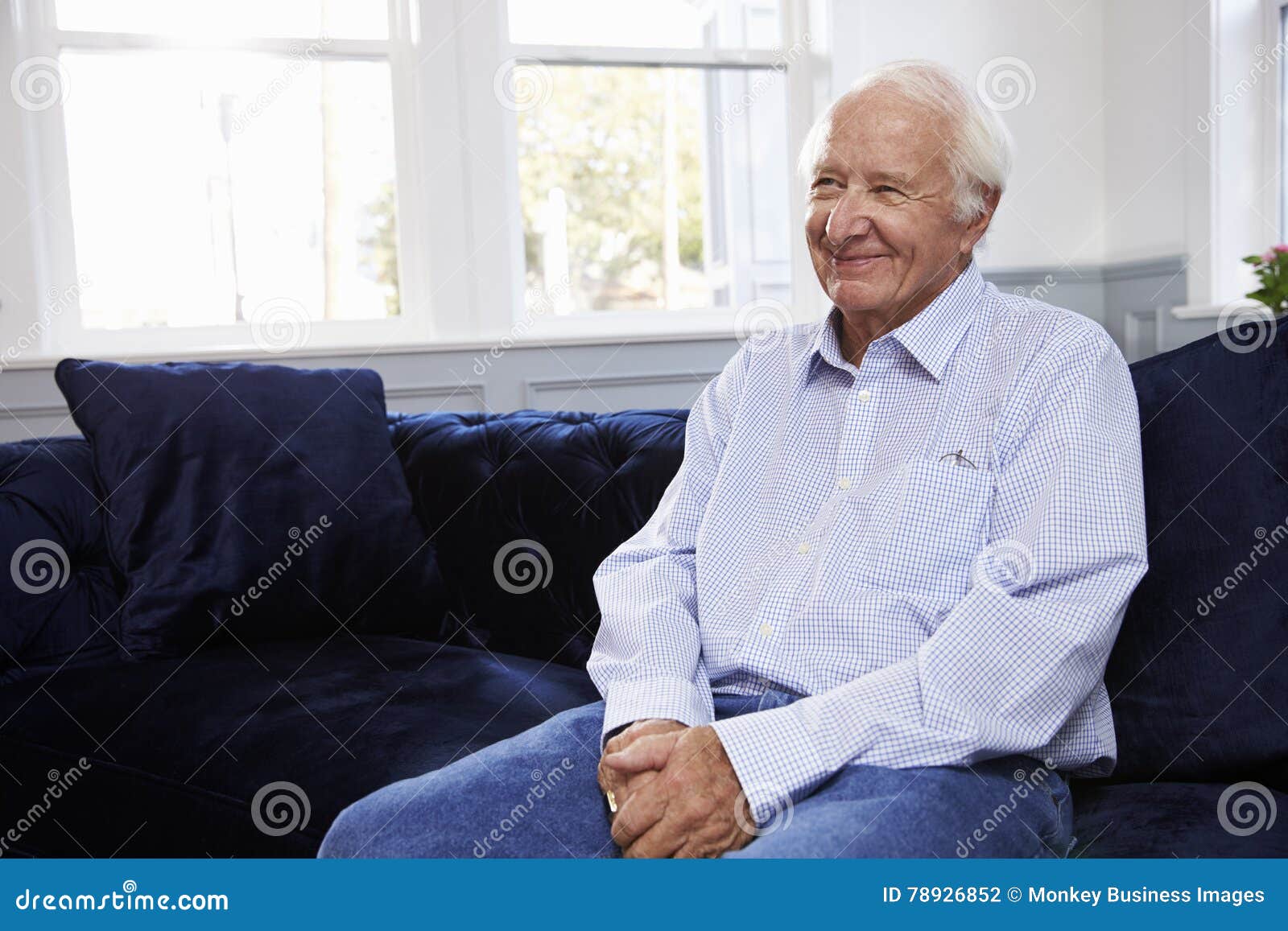 Smiling Senior Man Sitting on Sofa at Home Stock Photo - Image of happy ...