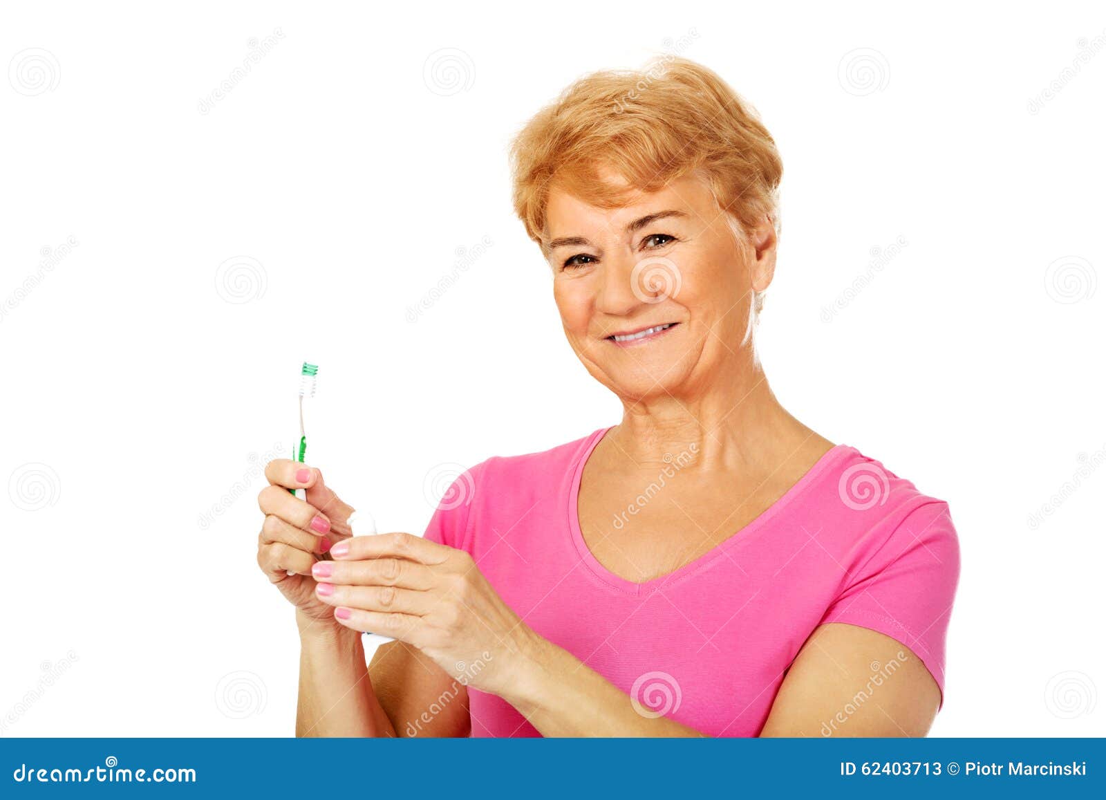 Smiling Senior Woman Holding Toothpaste and Toothbrush Stock Image ...