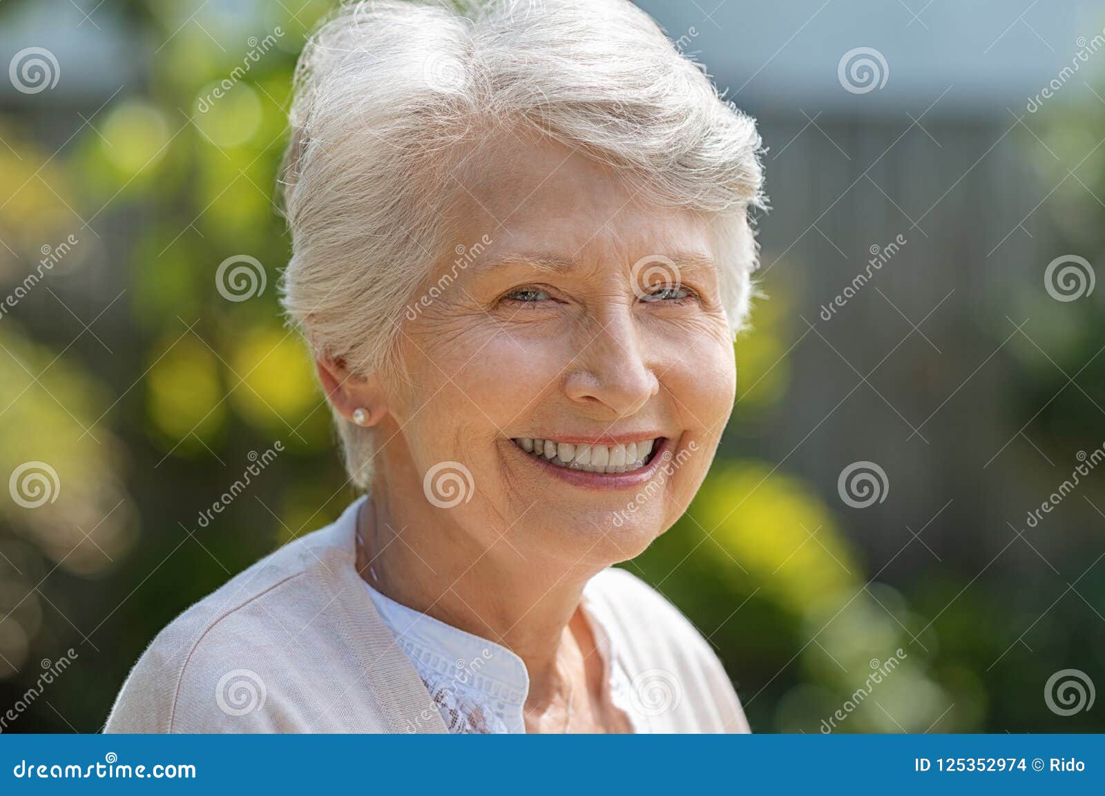 Smiling senior woman stock photo. Image of active, senior - 125352974 Smiling senior woman stock photo. Image of active, senior - 125352974