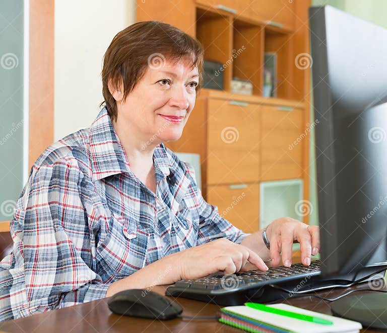 Smiling Senior Woman Using Keyboard Stock Image - Image of hobby, house ...