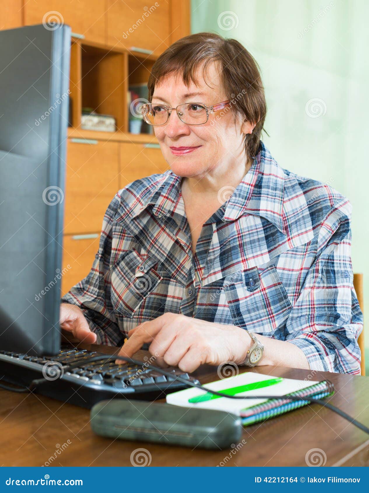 Smiling Senior Woman Using Keyboard Stock Photo - Image of leisure ...