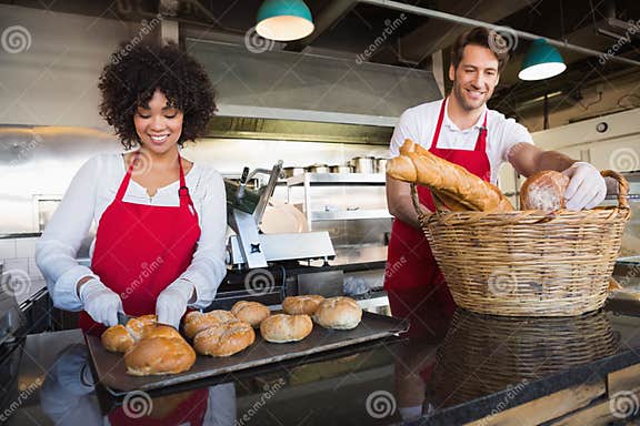 Smiling Servers Standing Behind the Counter Stock Image - Image of ...