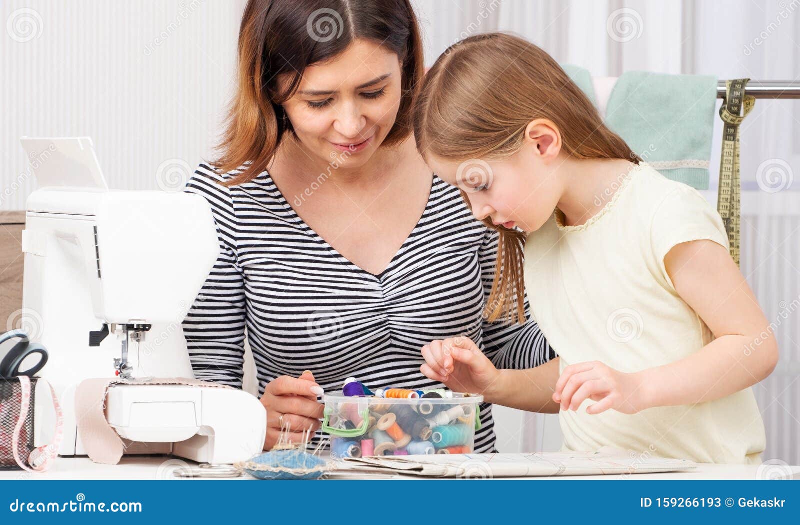 Sewing team choosing color stock image. Image of fabric - 159266193