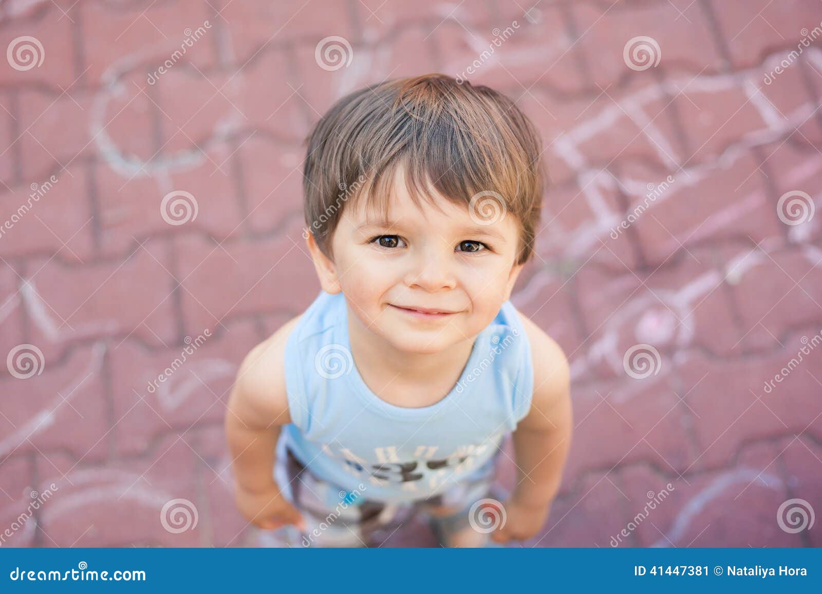 Smiling Small Boy Looking Up Stock Image - Image of positive, look ...