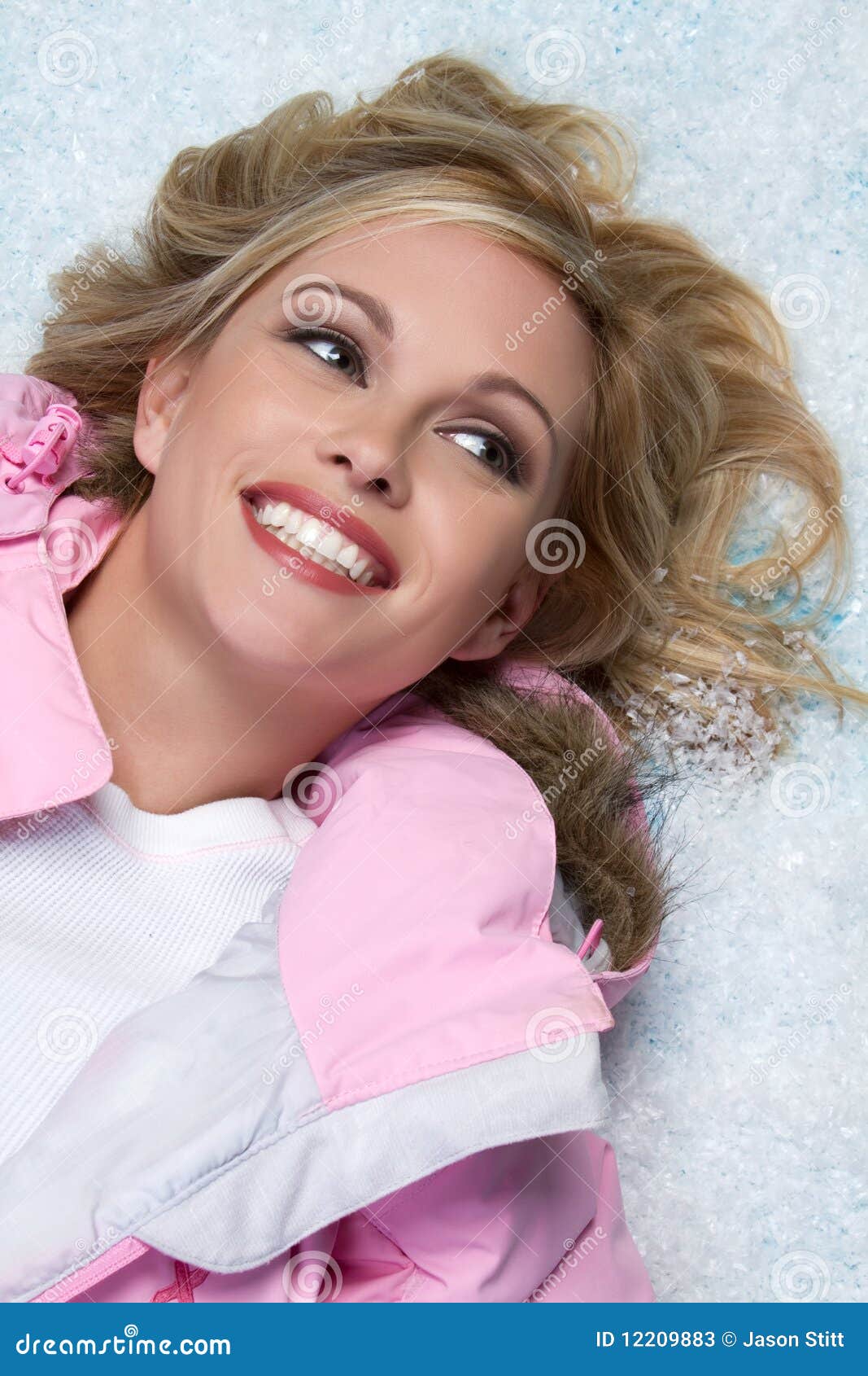 Smiling Snow Girl stock image. Image of laying, pretty - 12209883