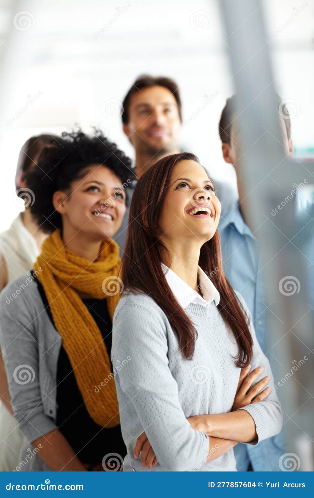 Smiling Spectators. a Group of Colleagues Looking Up at Someone on a ...
