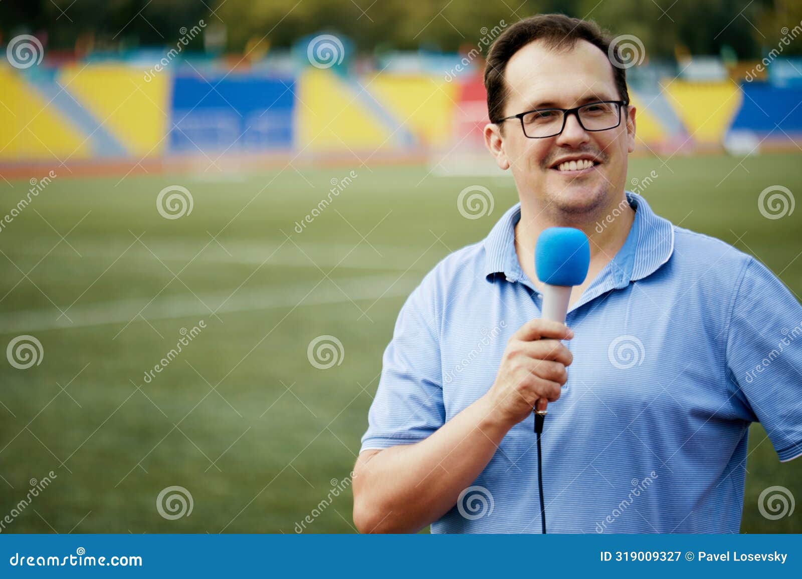 Smiling Sportscaster with Microphone is Reporting Stock Image - Image ...