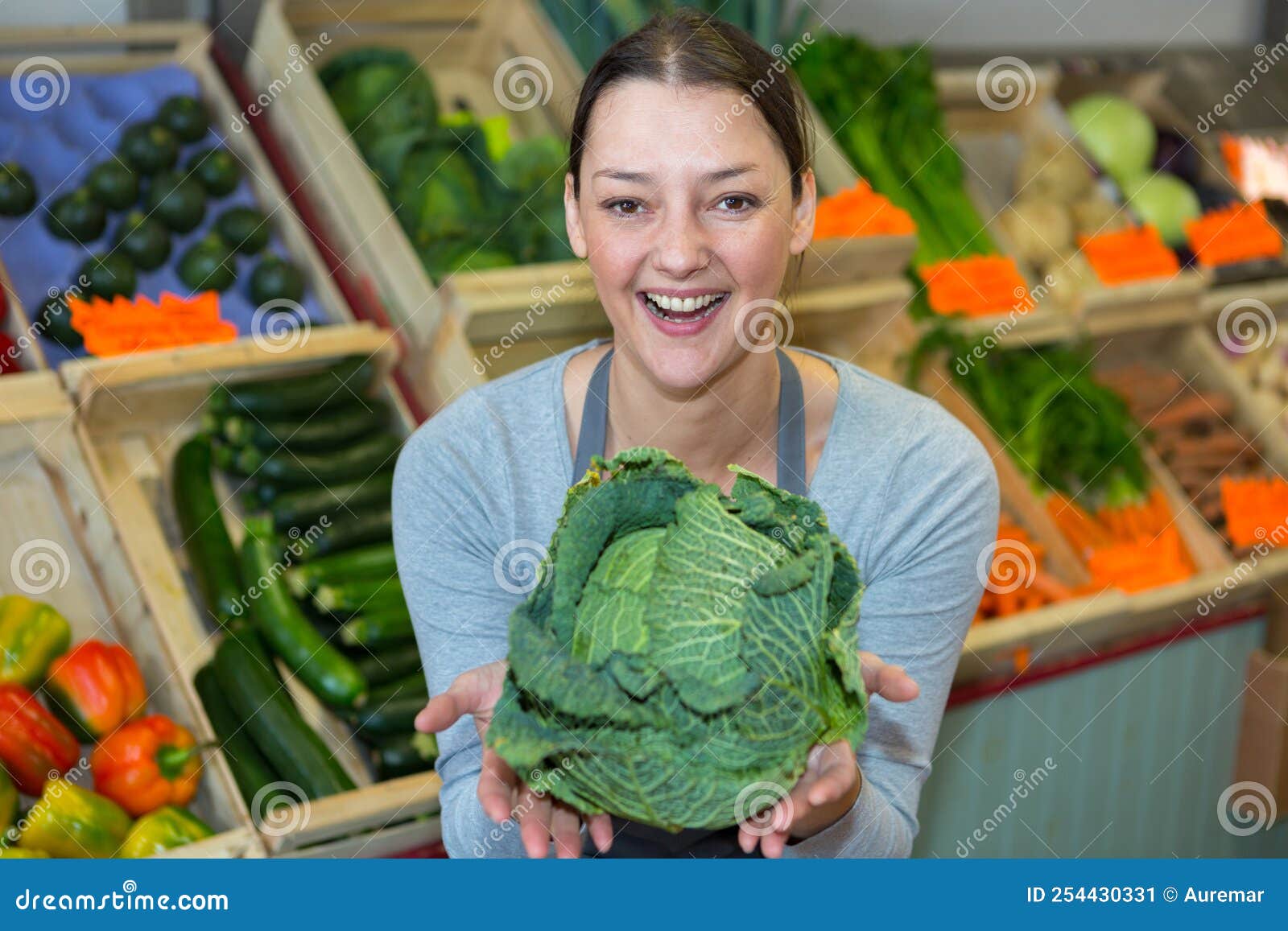 Smiling Staff Holding Organic Cabbage in Super Market Stock Image ...