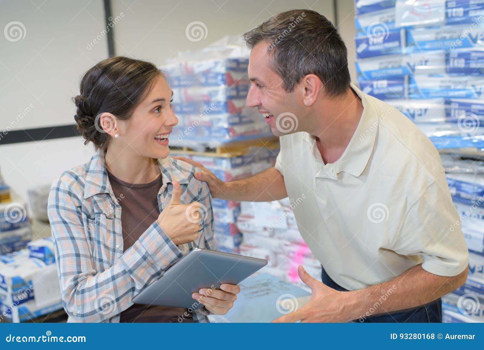 Smiling Staff Managing Stocks at Supermarket Stock Photo - Image of ...