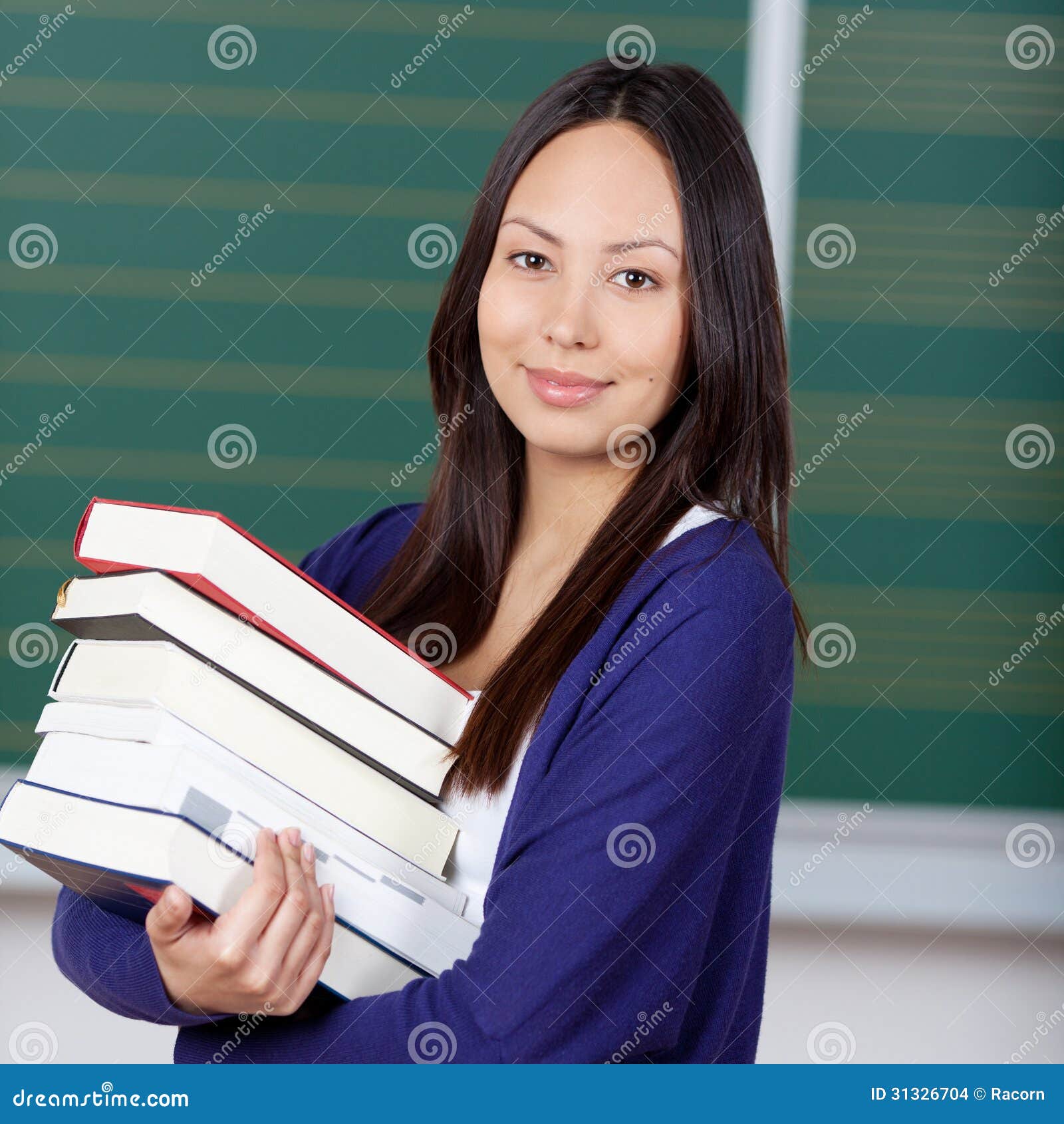 Smiling Student Carrying a Stack of Books Stock Photo - Image of asian ...